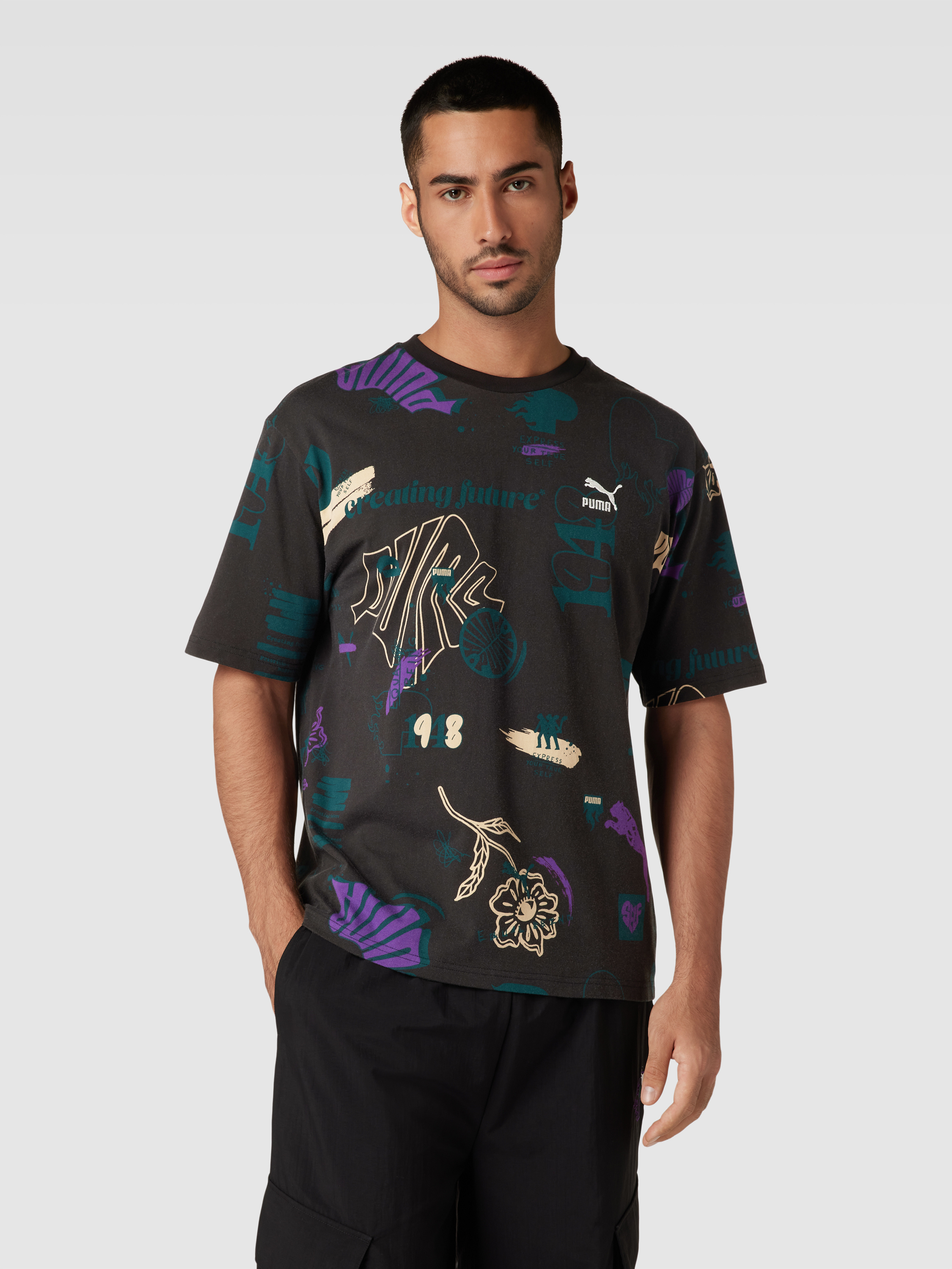 PUMA PERFORMANCE T-shirt met all-over print - PUMA X P&C* in zwart ...