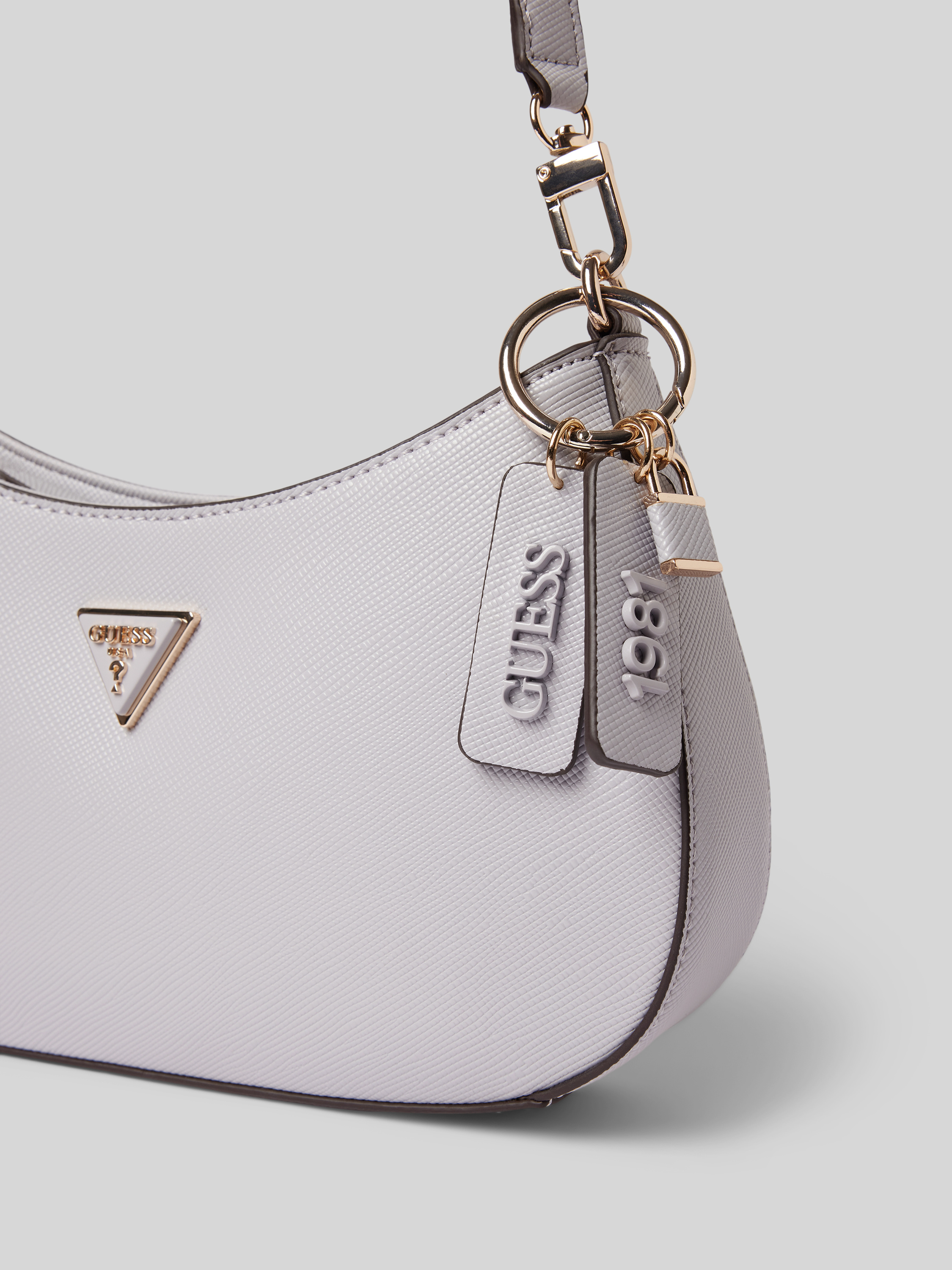 Guess Handtasche mit Label-Applikation Modell 'NOELLE' (flieder) online ...