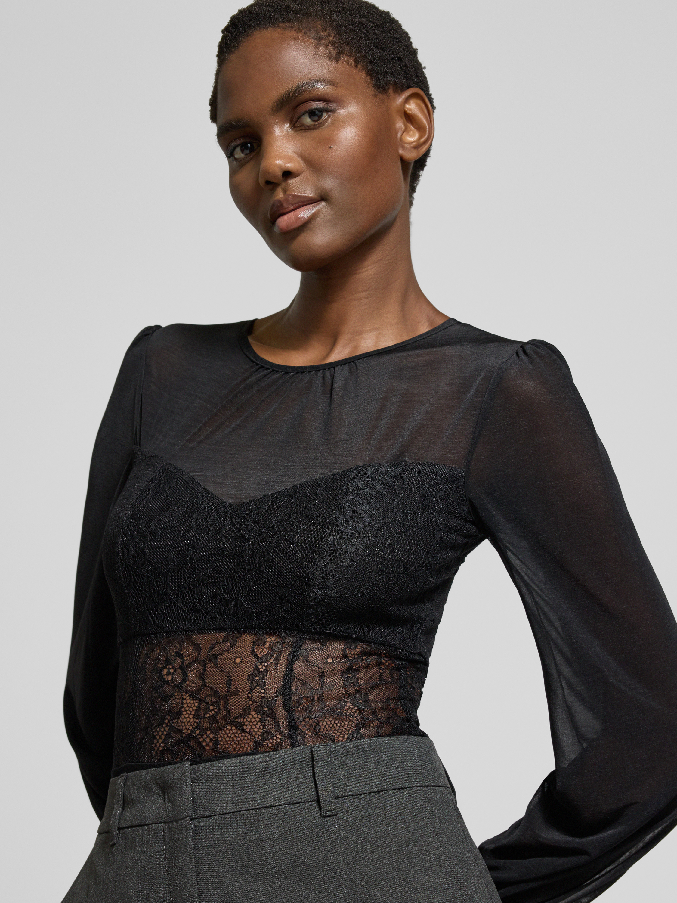 GUIDO MARIA KRETSCHMER WOMAN Slim fit body in semi-transparant design, model 'Noelia' in zwart ...