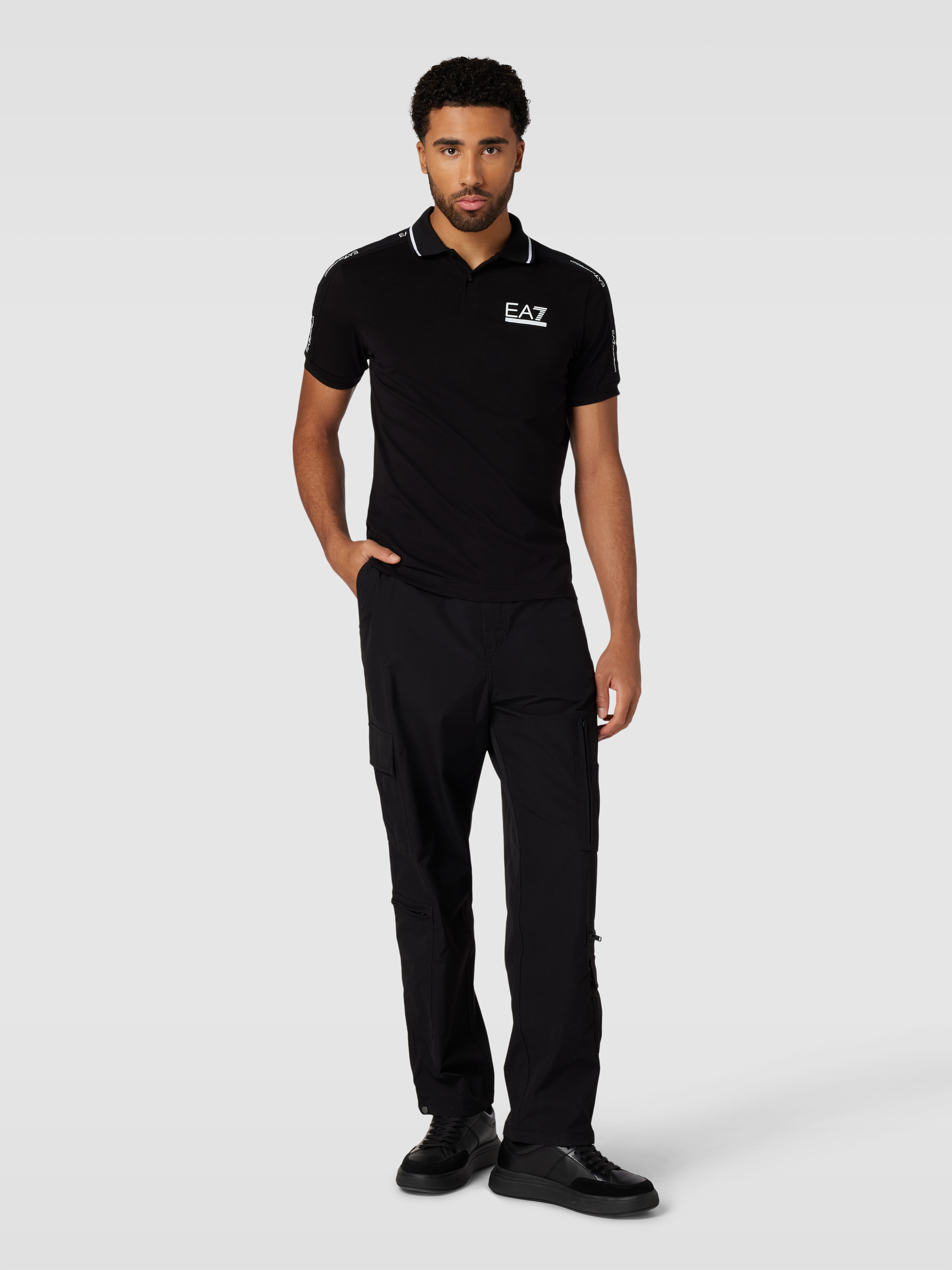 EA7 Emporio Armani Regular Fit Poloshirt mit Label-Print (black) online kaufen