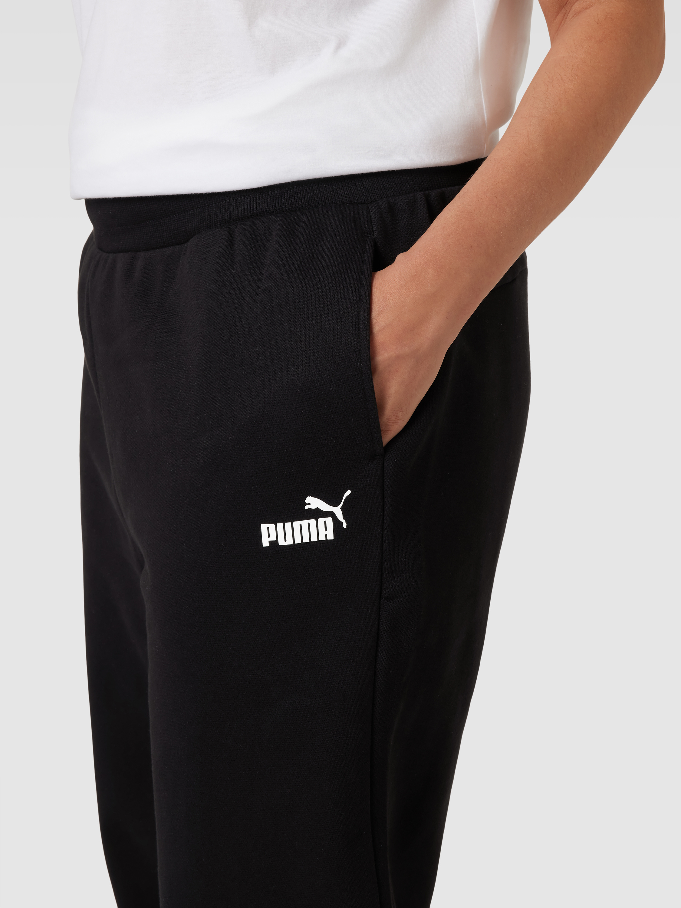 PUMA Performance Plus PLUS SIZE sweatpants met labeldetail in zwart ...