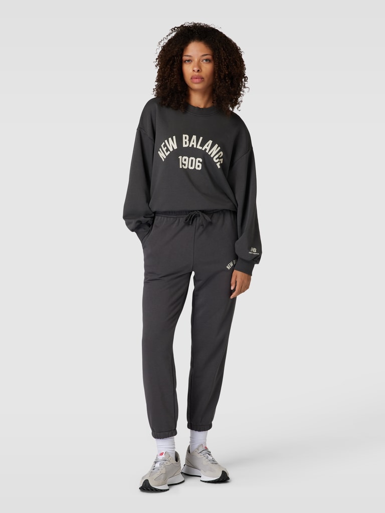 New Balance Sweatpants met logoprint, model 'Essentials Varsity' in ...