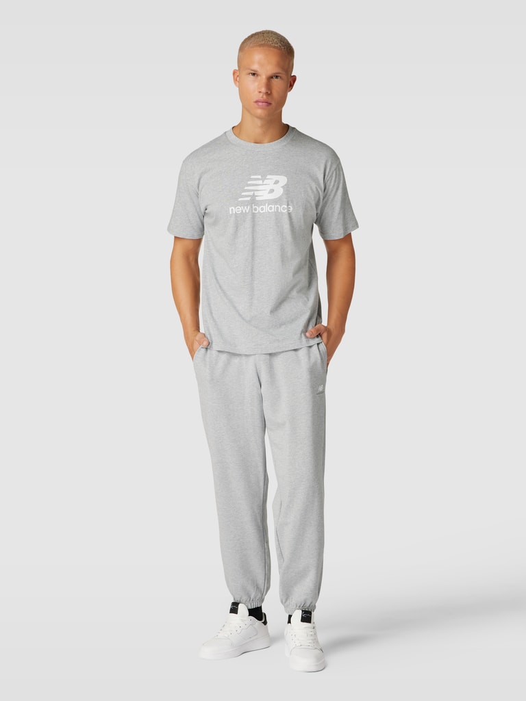 New Balance Sweatpants met labeldetail in lichtgrijs gemêleerd online ...