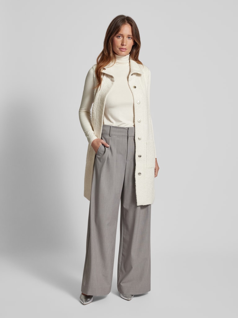 Kup online monari Kamizelka ze stójką i wpuszczanymi kieszeniami (piaskowy)