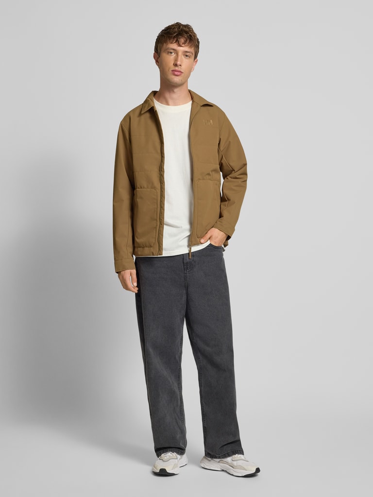 Helly Hansen Jack met logo en steekzakken, model 'ESCAPE INS' in camel ...
