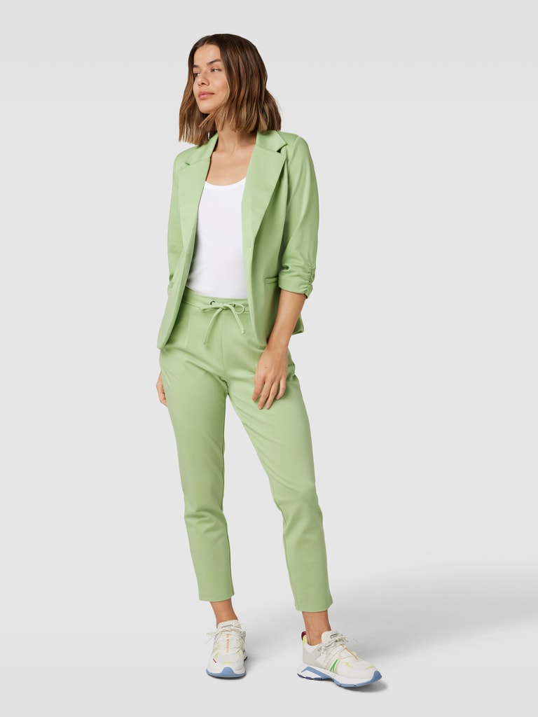 Kup online Fransa Spodnie z aplikacją z logo (trzcinowy)