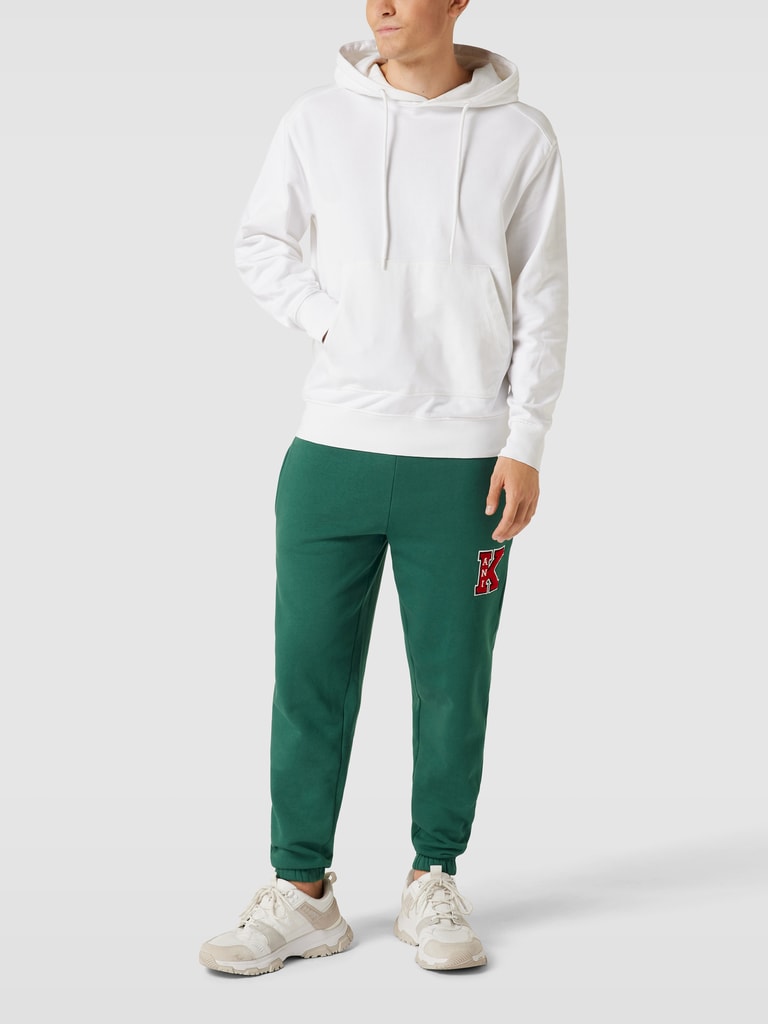 KARL KANI Sweatpants met labelpatch, model 'Retro' in flessengroen ...