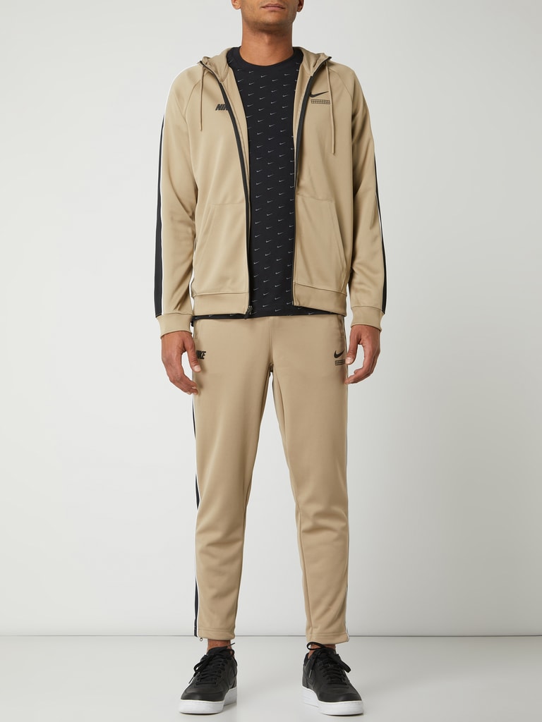 Nike Sweatpants mit Galonstreifen (beige) online kaufen