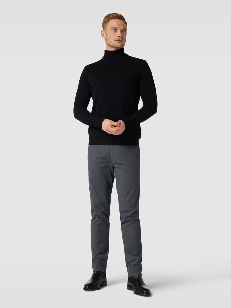 Kup online Mmx Chinosy o kroju slim fit z detalem z logo model ‘LUPUS ...