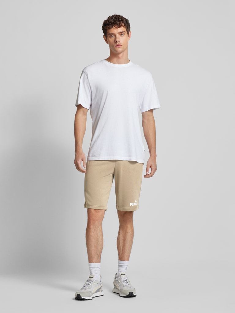PUMA PERFORMANCE Sweatshorts met elastische band in beige online kopen ...