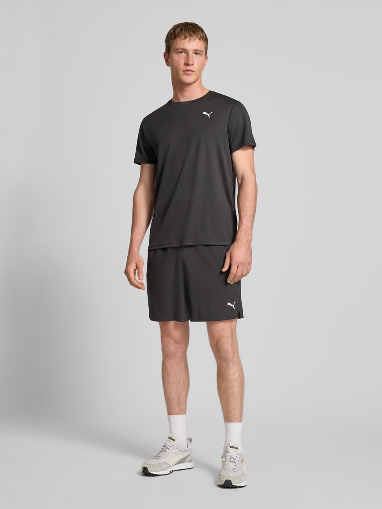 PUMA PERFORMANCE Korte broek met logo en elastische band in zwart ...