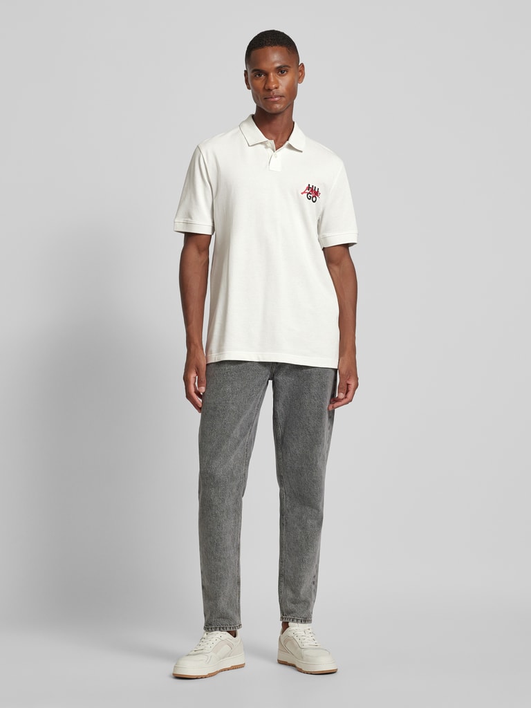 Kup online HUGO Koszulka polo o kroju regular fit z nadrukiem z logo i ...