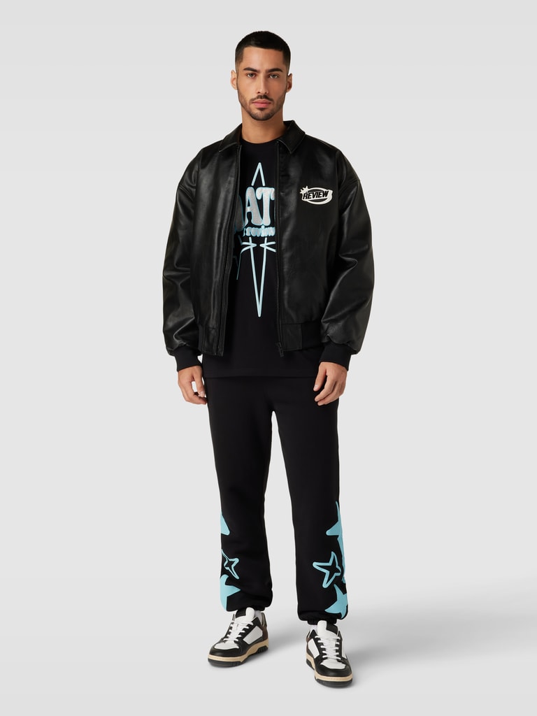 Review X MATW Sweatpants met DGUK-print - MATW x REVIEW in zwart online ...